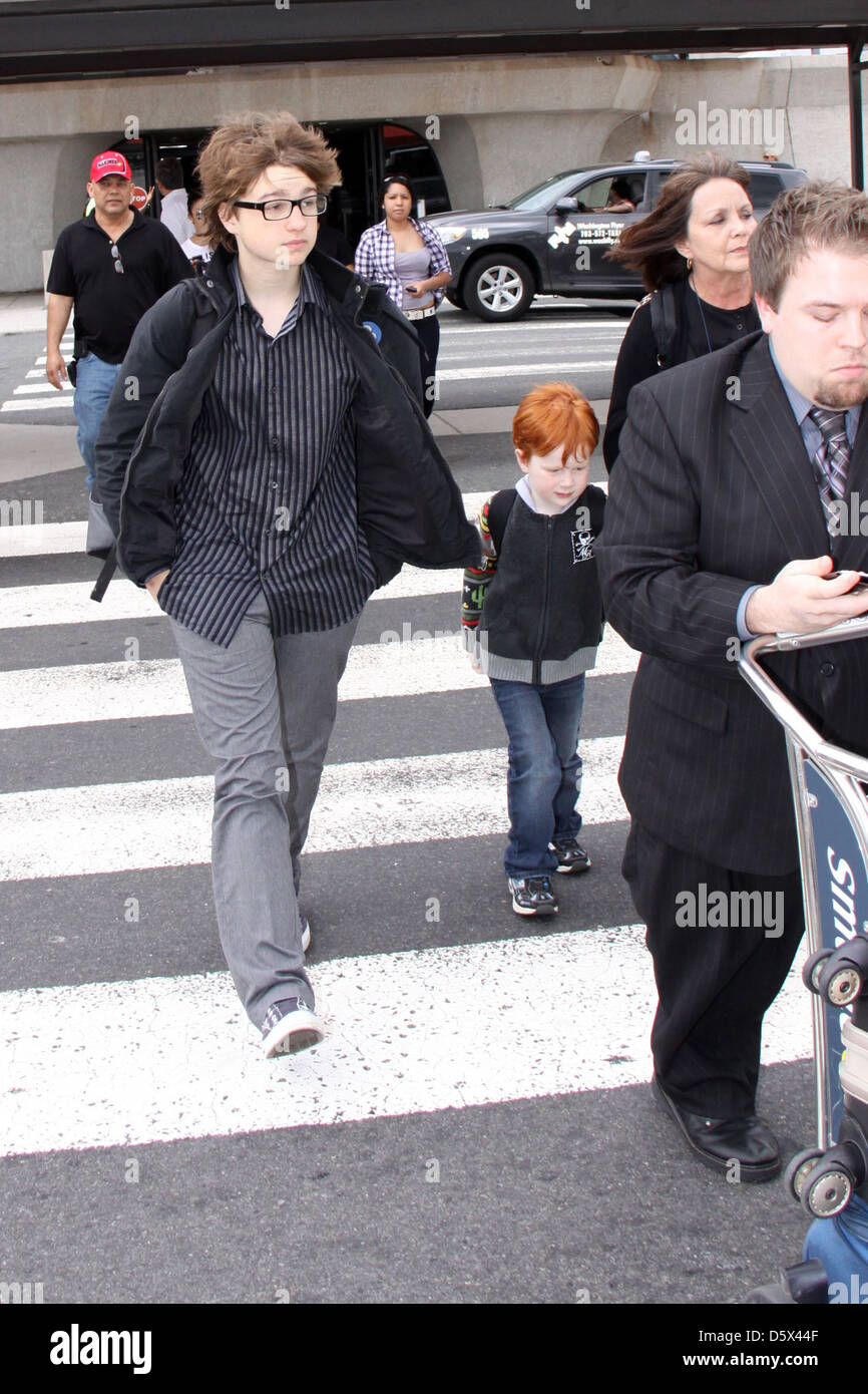 Two and a Half Men ' star Angus T. Jones arrives at Washington Dulles ...