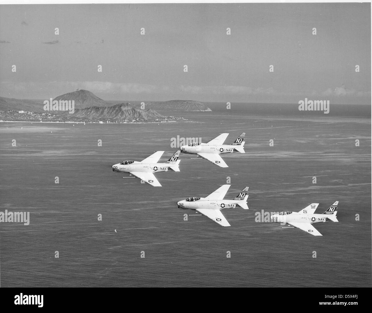 North American FJ-4B Furys of VA-214 fly over Diamond Head, Hawaii ...