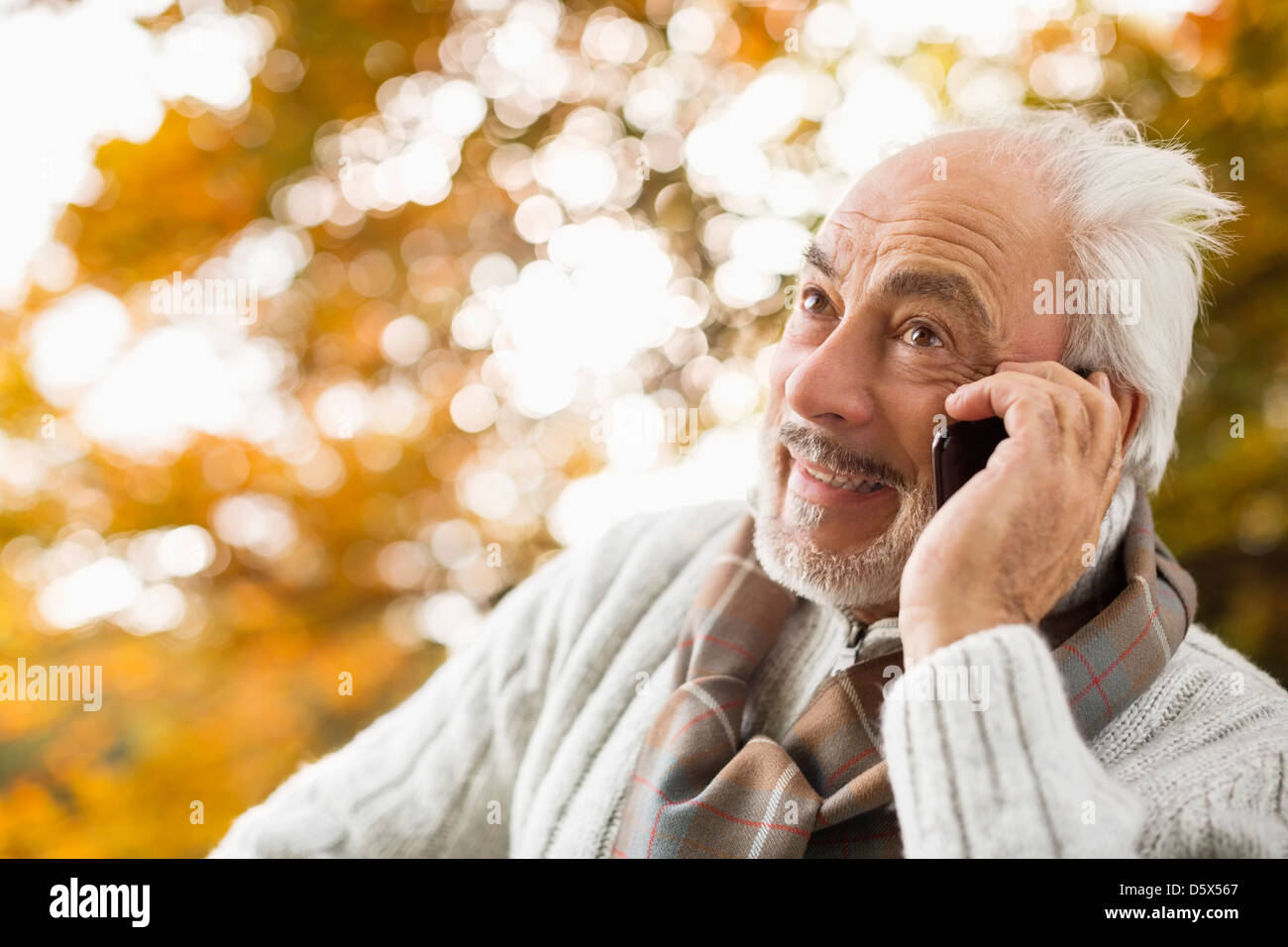Older Person Talking Phone High Resolution Stock Photography and Images ...