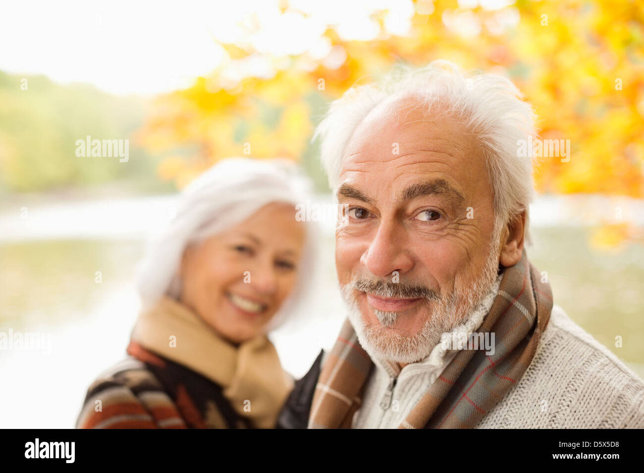 Older couple standing in park Stock Photo - Alamy