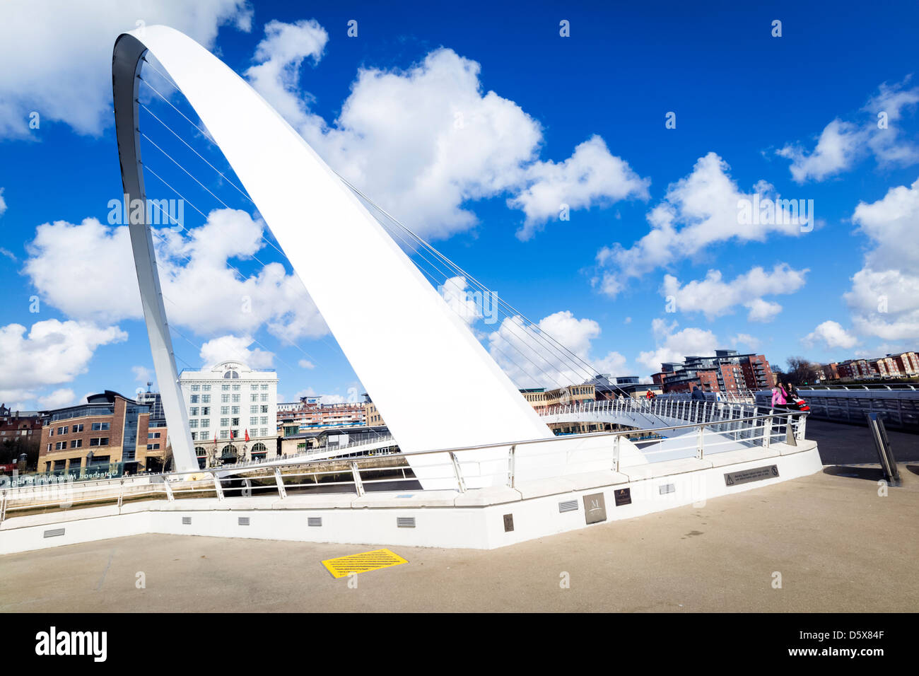 Gateshead Millennium Bridge with Newcastle in the distance Stock Photo ...