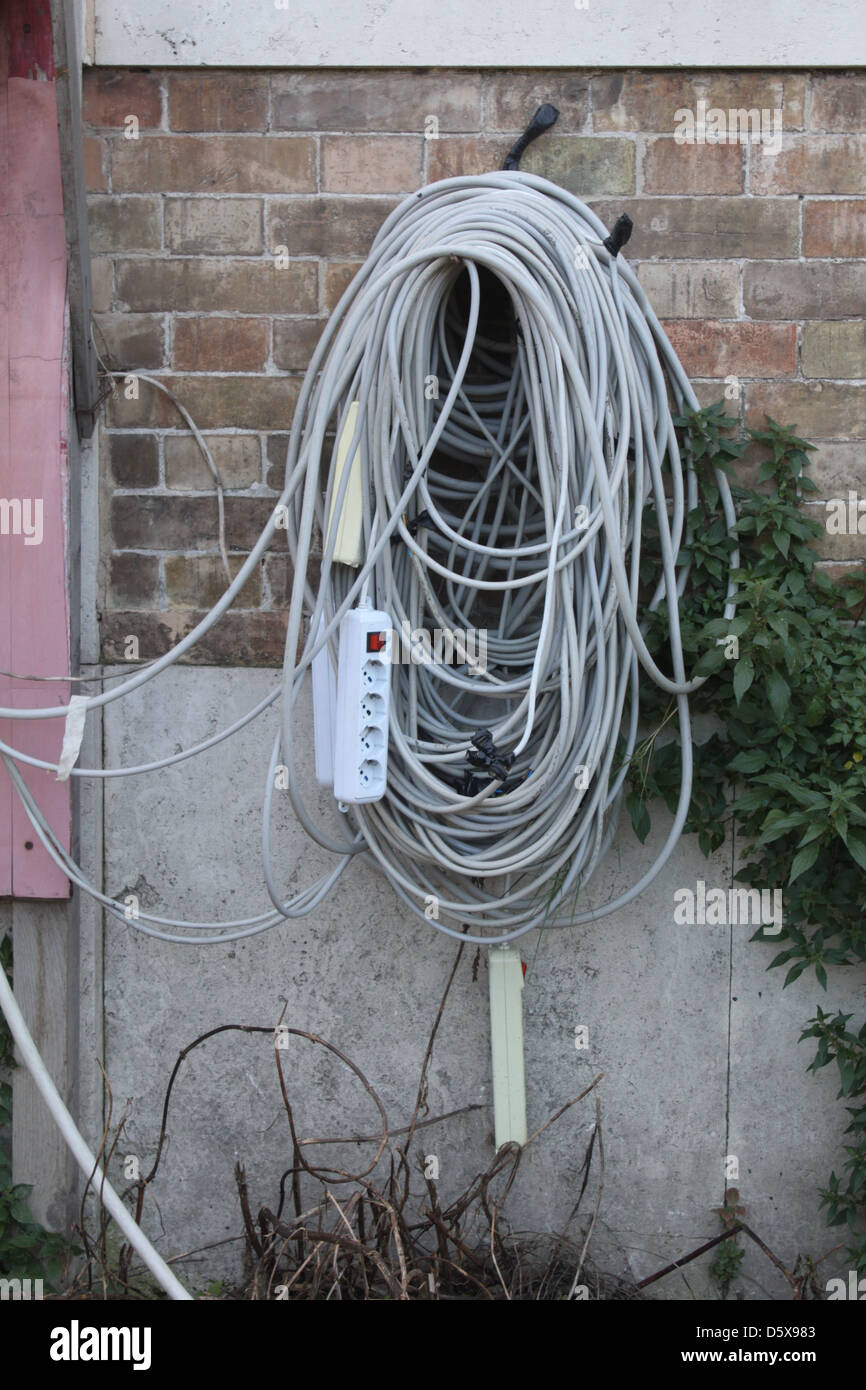 power socket and cable hanging outdoors Stock Photo - Alamy