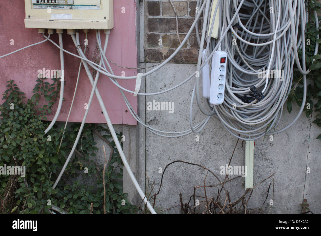 power socket and cable hanging outdoors Stock Photo - Alamy