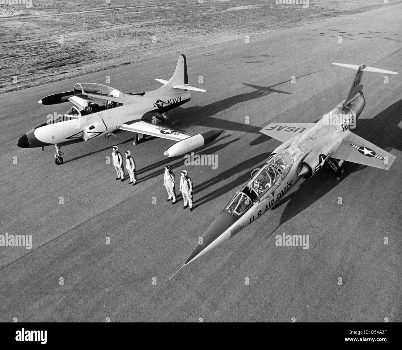 A Lockheed T2V-1 Sea Star trainer jet parked next to a Lockheed F-104B ...