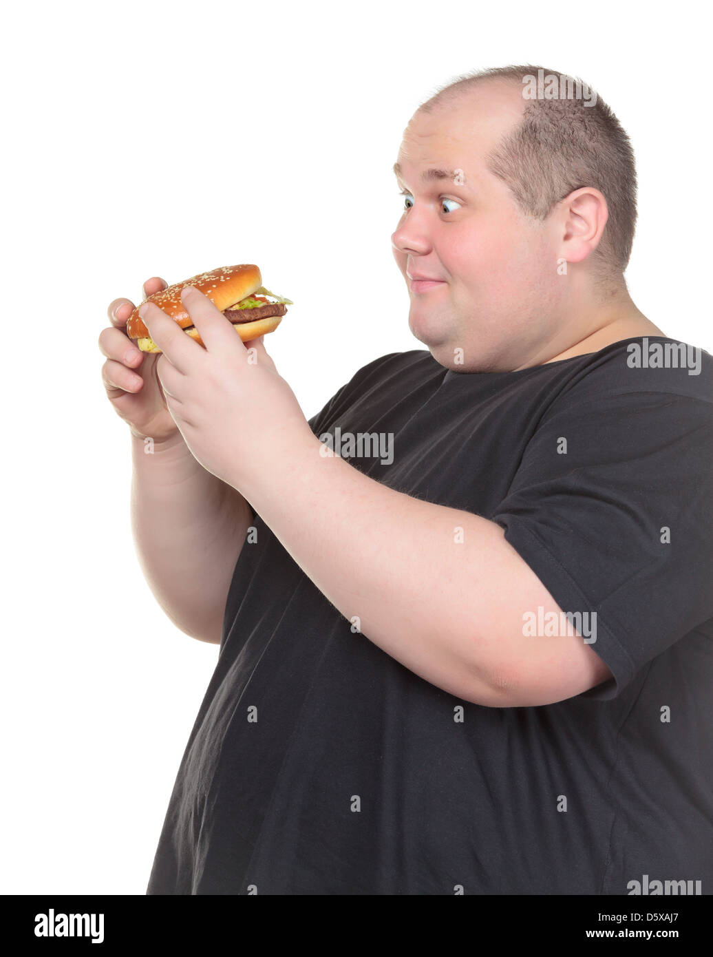 Fat Man Looks Lustfully at a Burger Stock Photo - Alamy