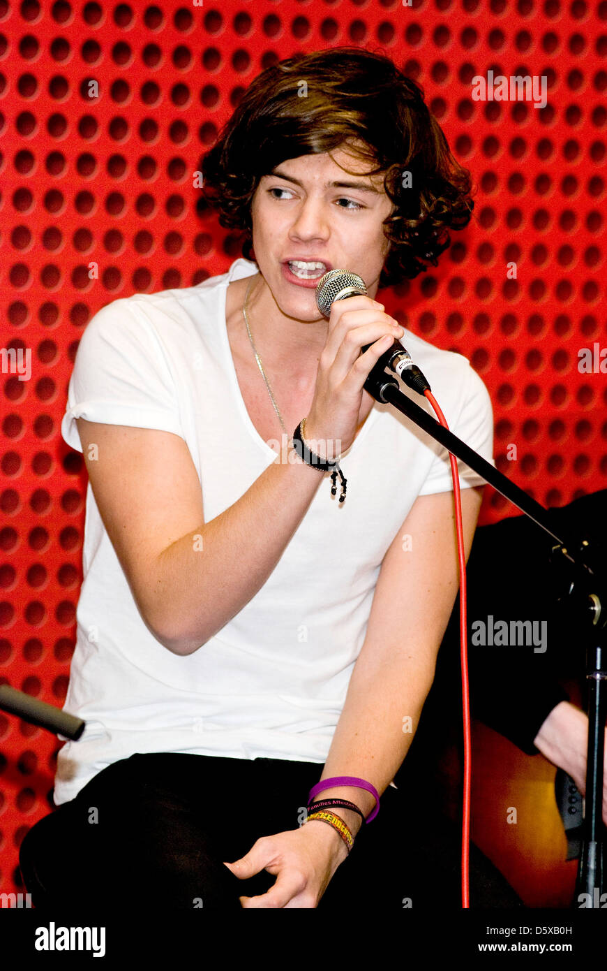 Harry Styles British boy band One Direction perform at 103.5 KISS FM ...