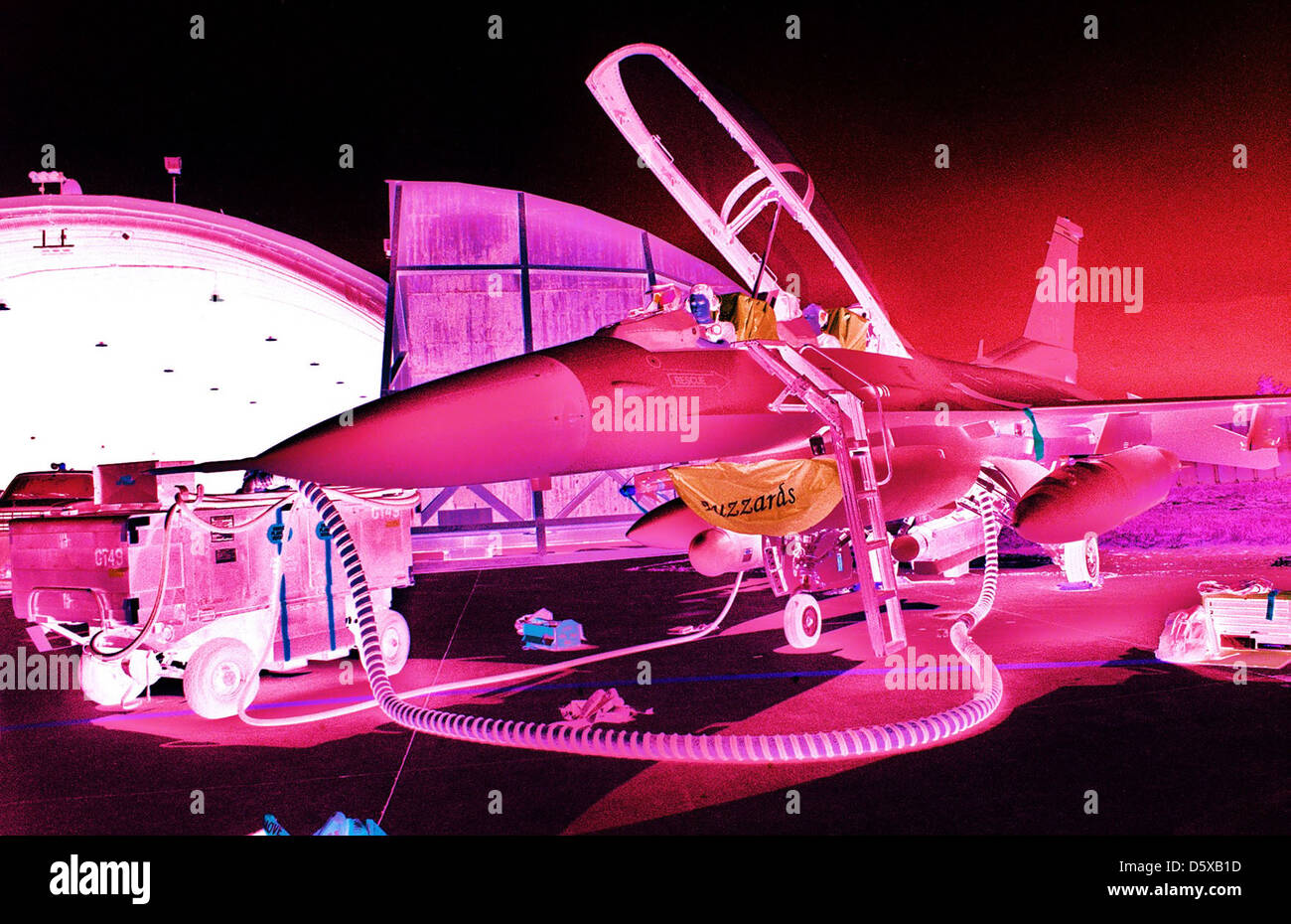 Avionics specialists observe a Laser Destination Calibration test on an ...