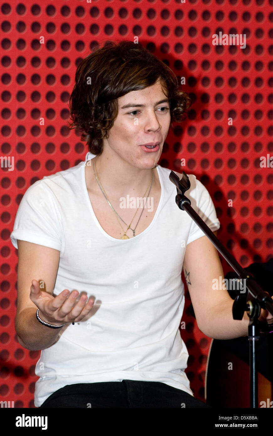 Harry Styles British boy band One Direction perform at 103.5 KISS FM ...