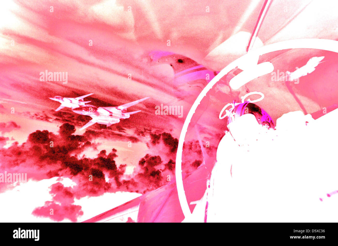 A cockpit view of three Grumman F-14A Tomcats flying in formation ...