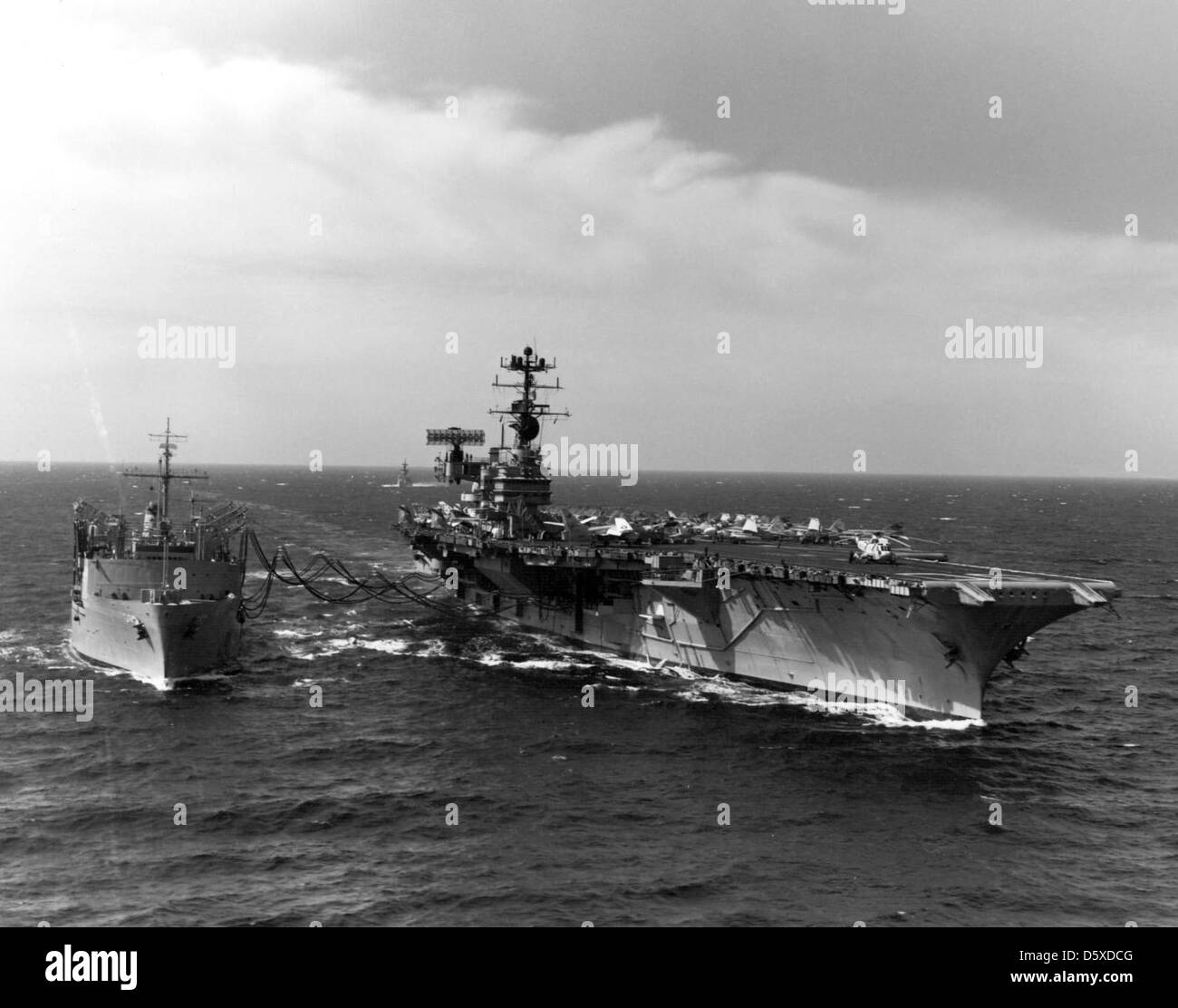 The USS Saratoga (CV-60) is an aircraft carrier that refuels at sea ...