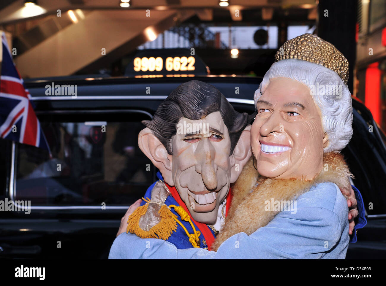 Masked royal look-a-likes posing as Prince Charles and Queen Elizabeth ...