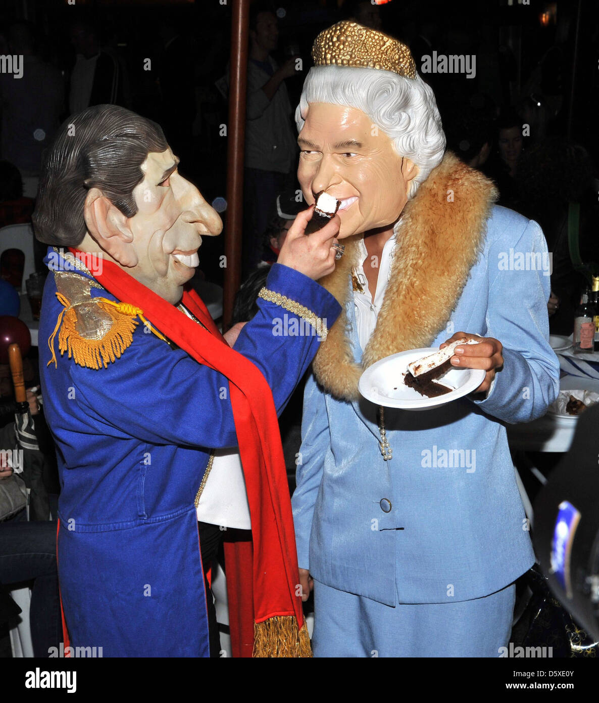 Masked royal look-a-likes posing as Prince Charles and Queen Elizabeth ...