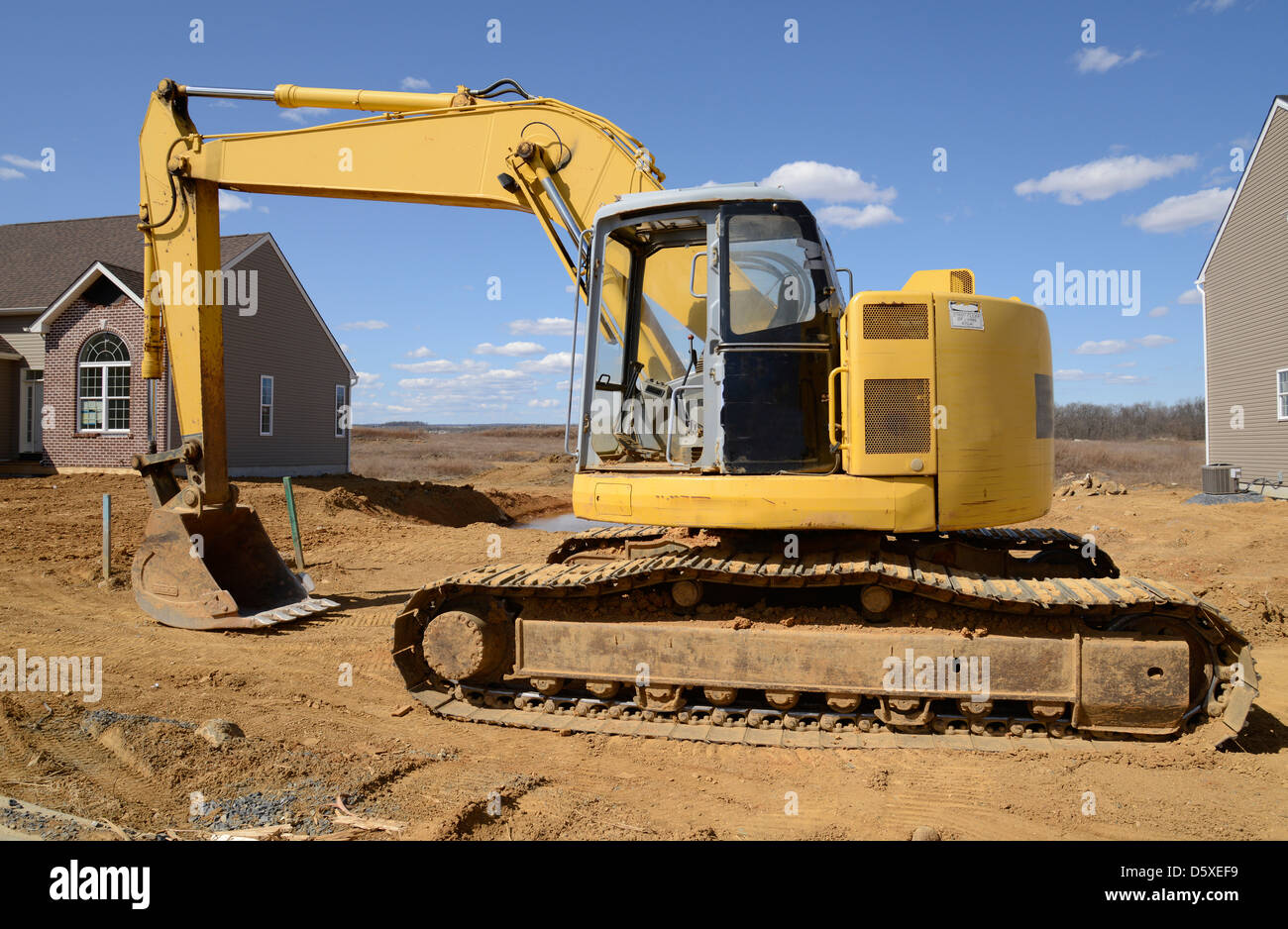 backhoe, a type of heavy duty construction equipment used in excavation ...