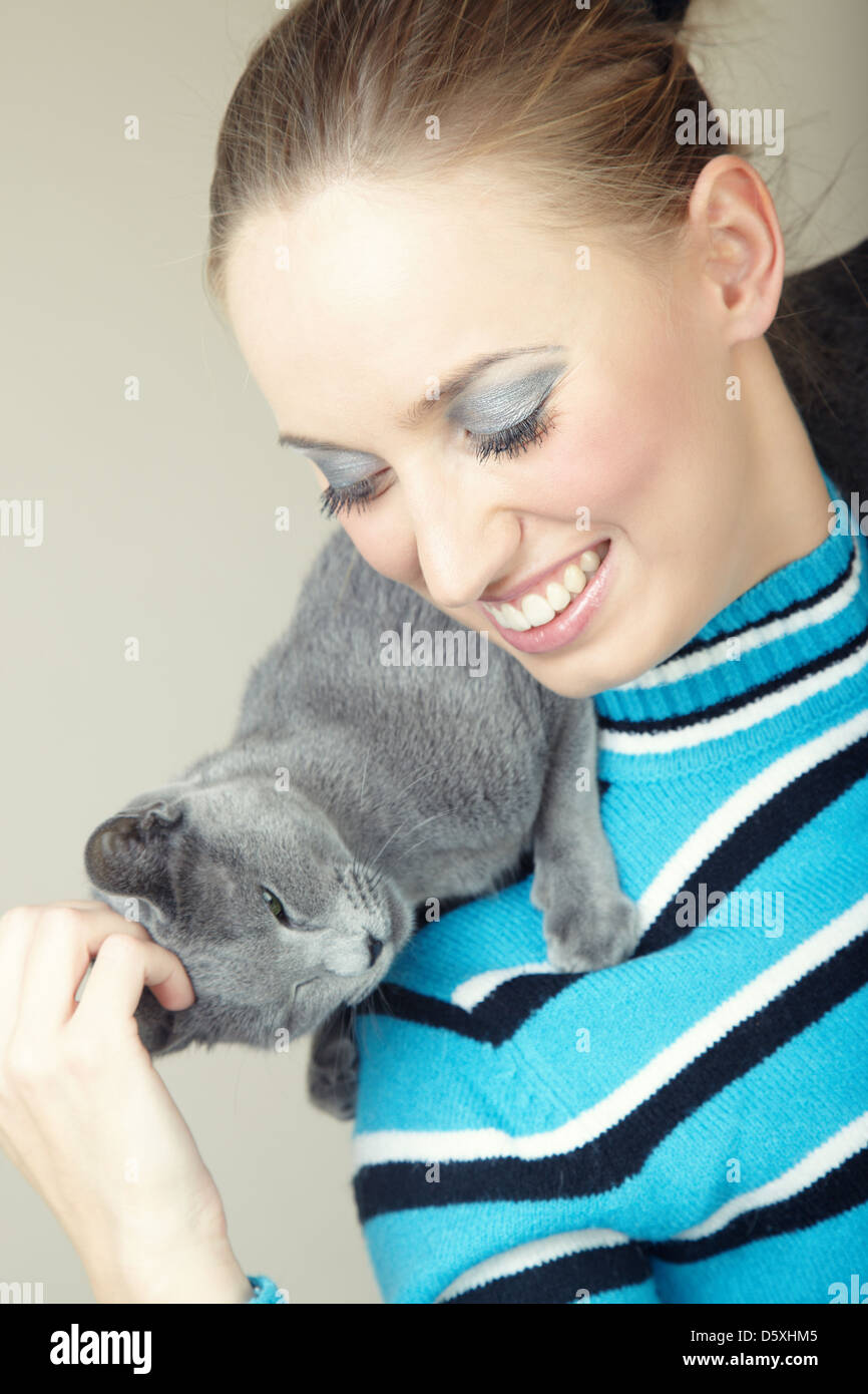 Lady and cat Stock Photo - Alamy