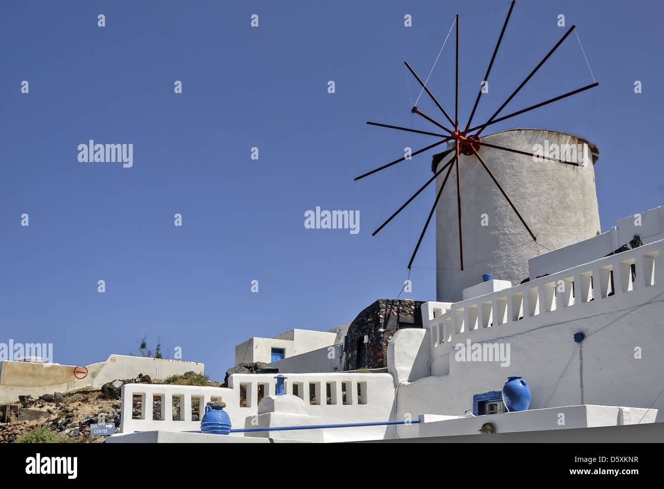 Windmill and Pots Iea Santorini Greece Stock Photo - Alamy