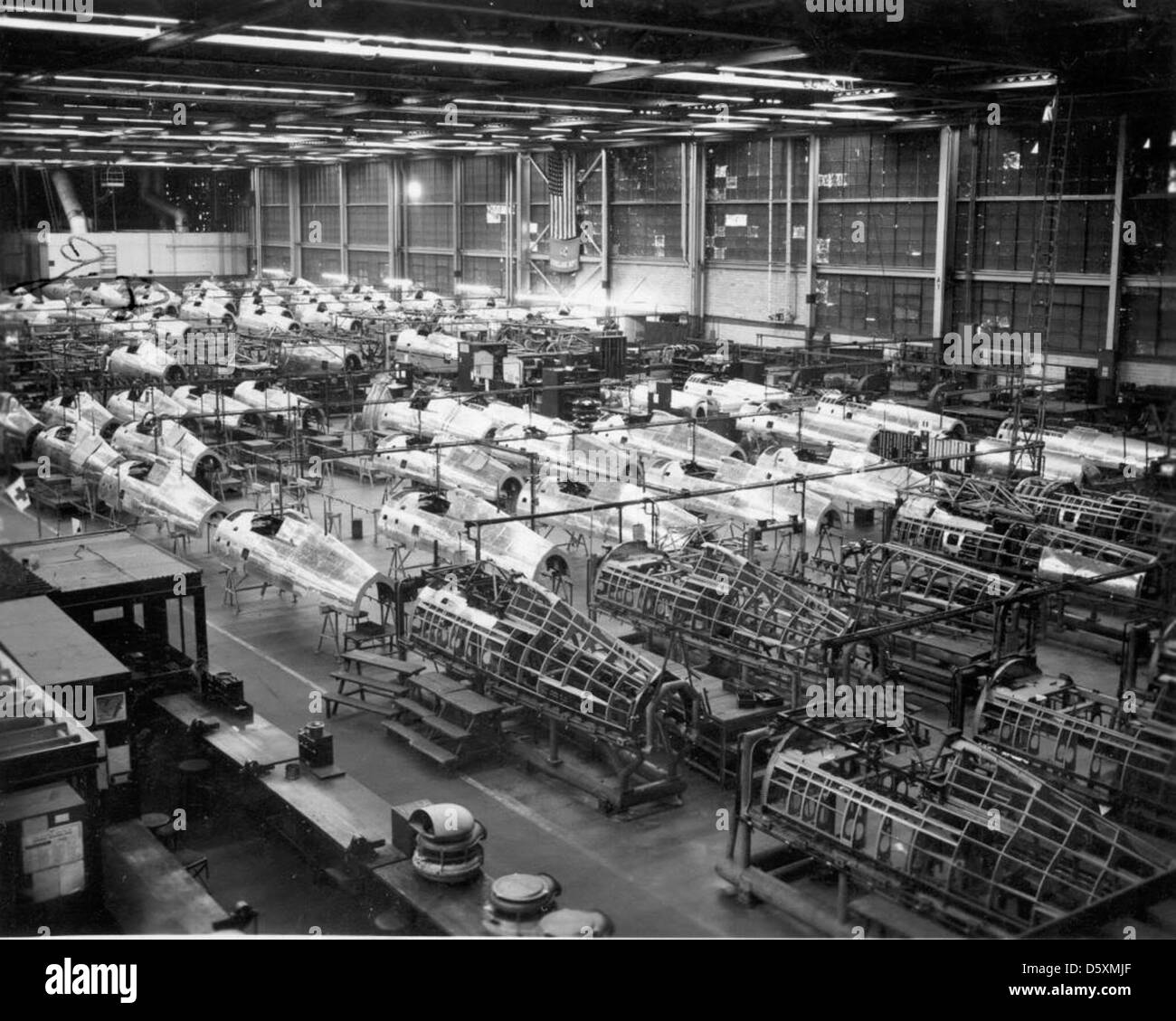 This image shows the fuselage assembly process for the Republic P-47D ...