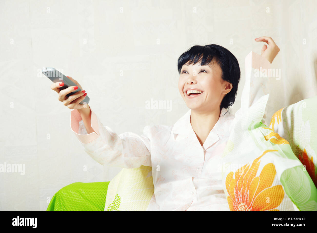 Changing TV channels Stock Photo - Alamy