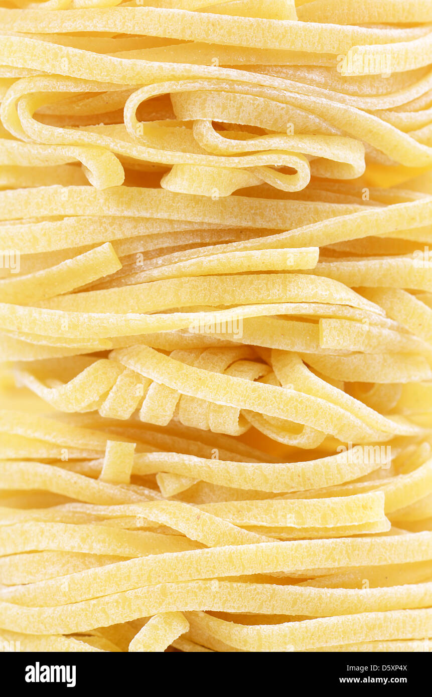 Uncooked pasta spaghetti macaroni Stock Photo - Alamy