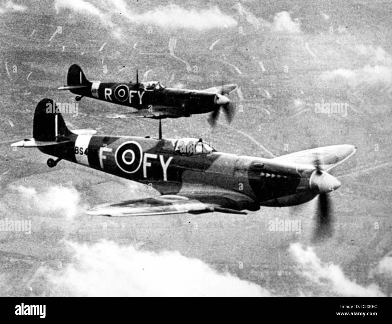 Two British Supermarine Spitfires in flight, showcasing the iconic ...