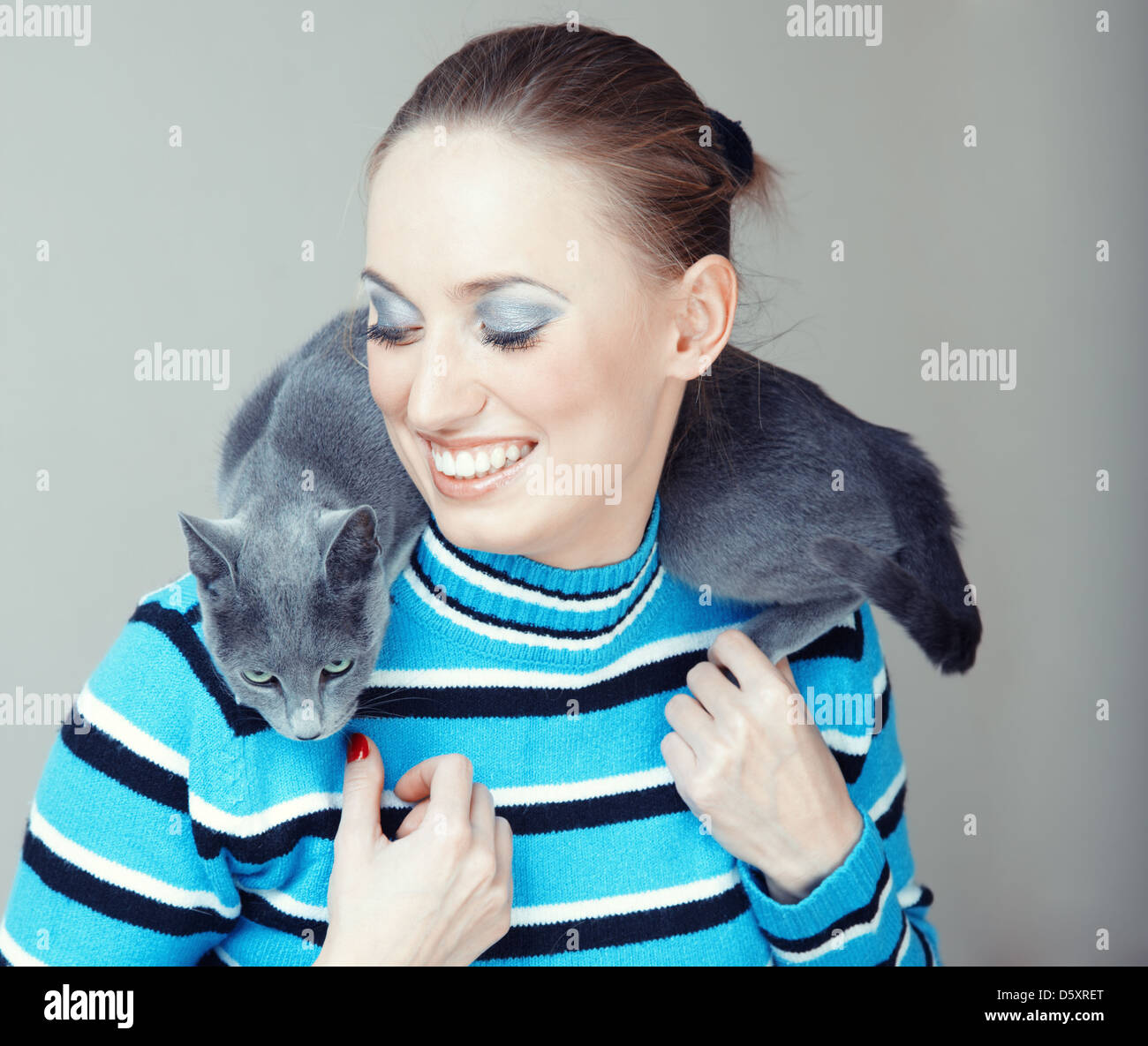 Lady and cat Stock Photo - Alamy