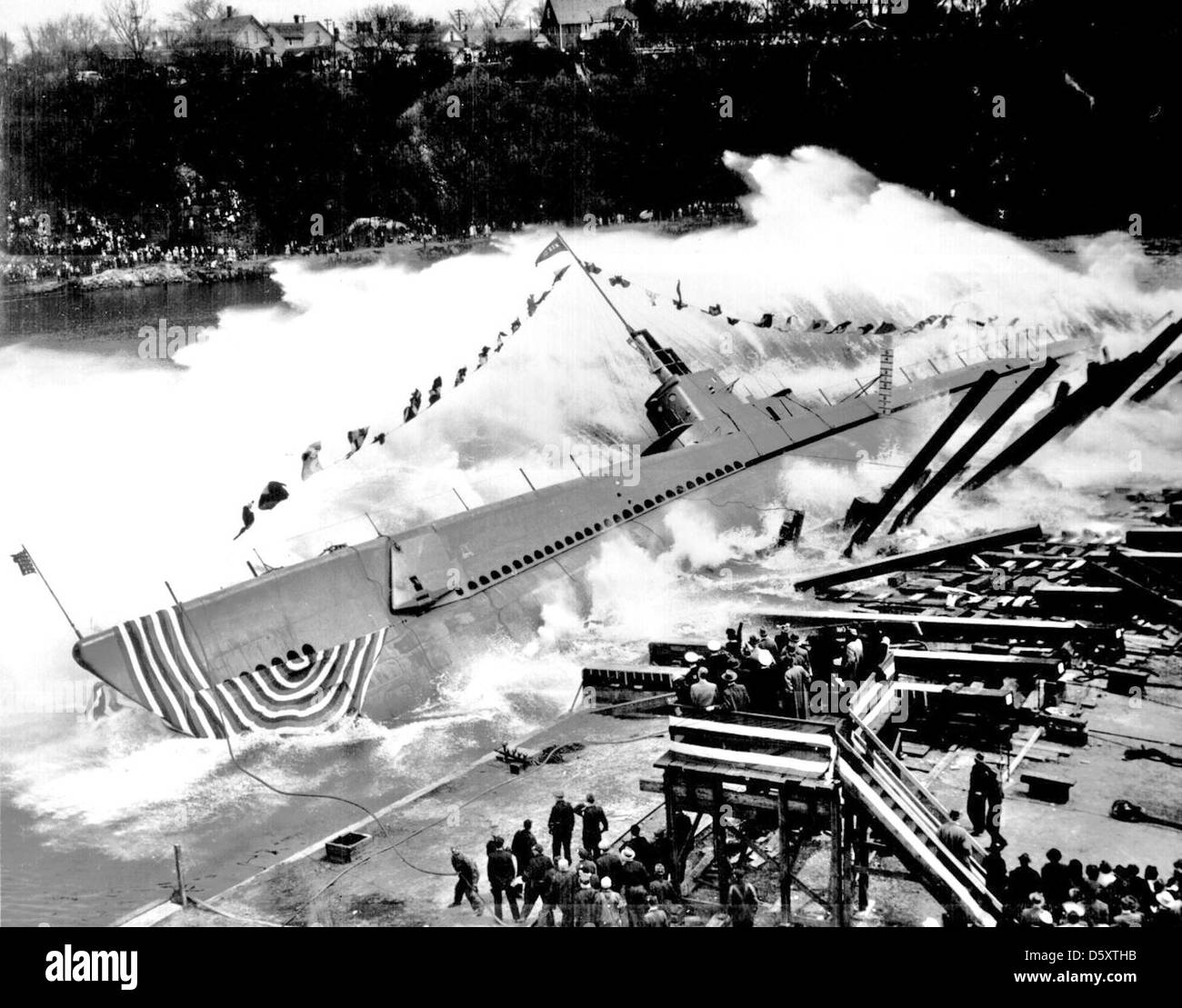 A submarine launching missile or weapon during a naval operation ...