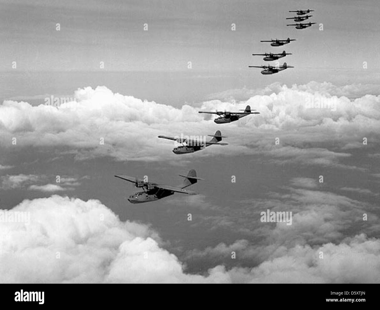 Nine U.S. Navy Consolidated PBY-5 'Catalina' patrol bombers fly in ...