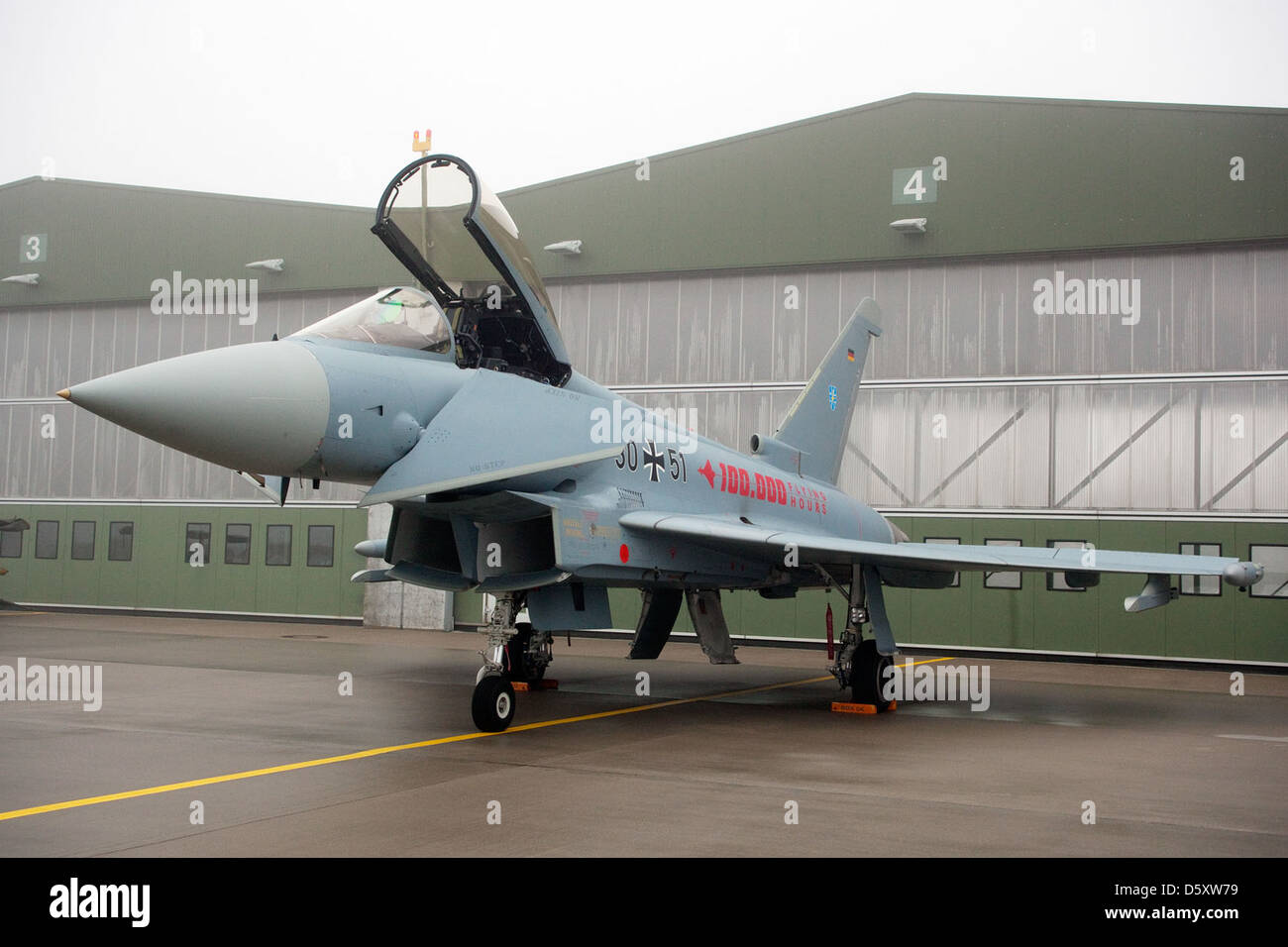 A Eurofighter Typhoon from Laage Air Base lands after completing its ...