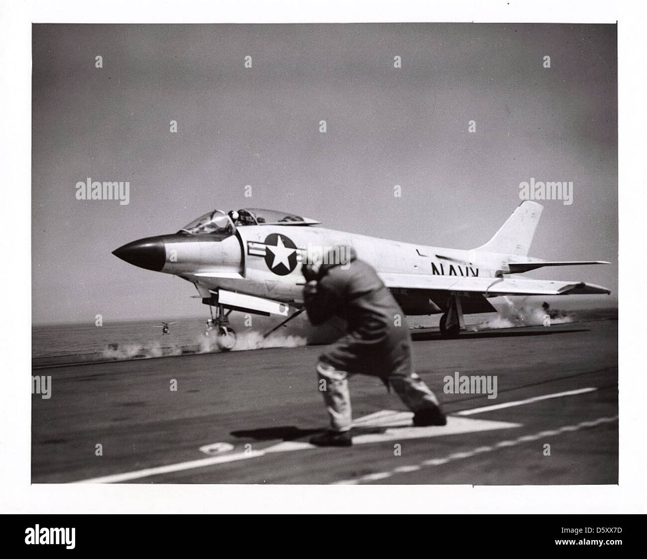 The McDonnell F3H-2N Demon is shown during carrier trials aboard the ...