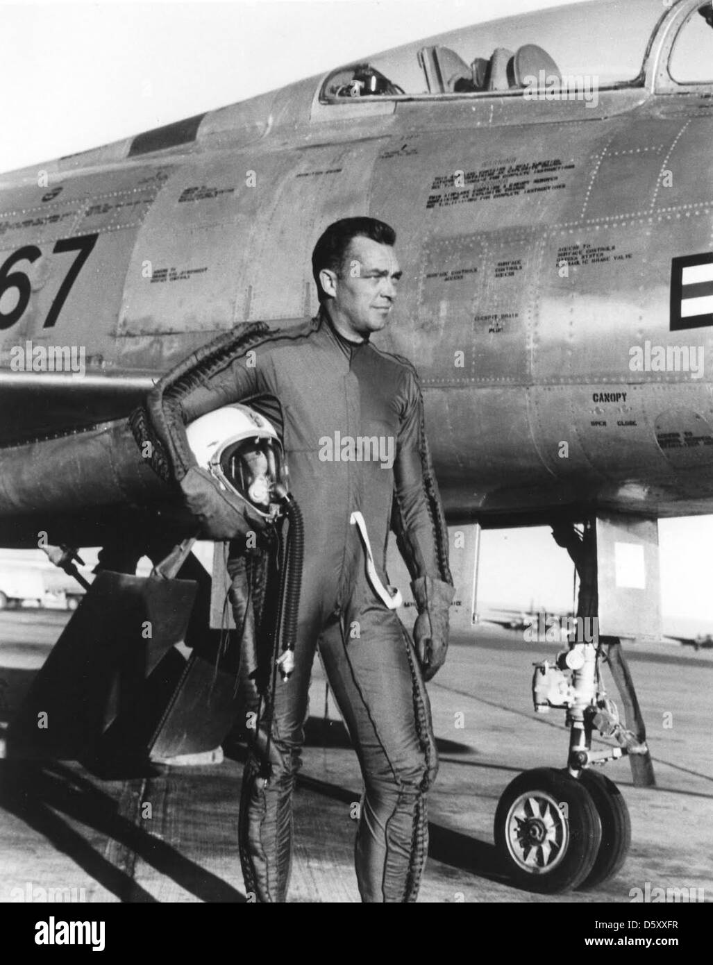 Colonel Harold G. Russell is seen with the North American F-100 'Super ...