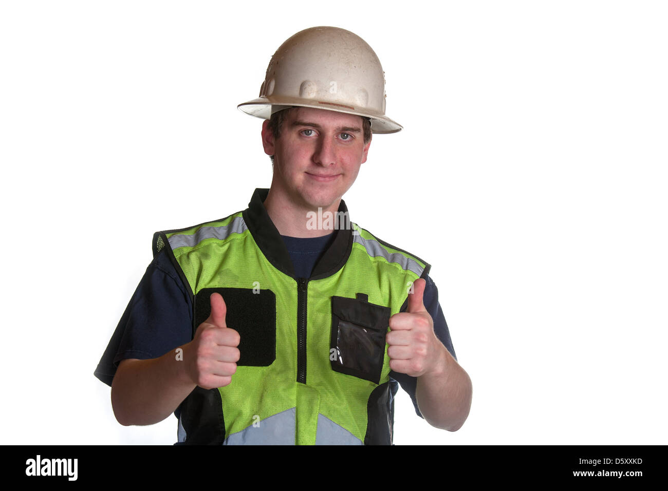 Construction Worker in safety jacket giving thumbs up Stock Photo - Alamy