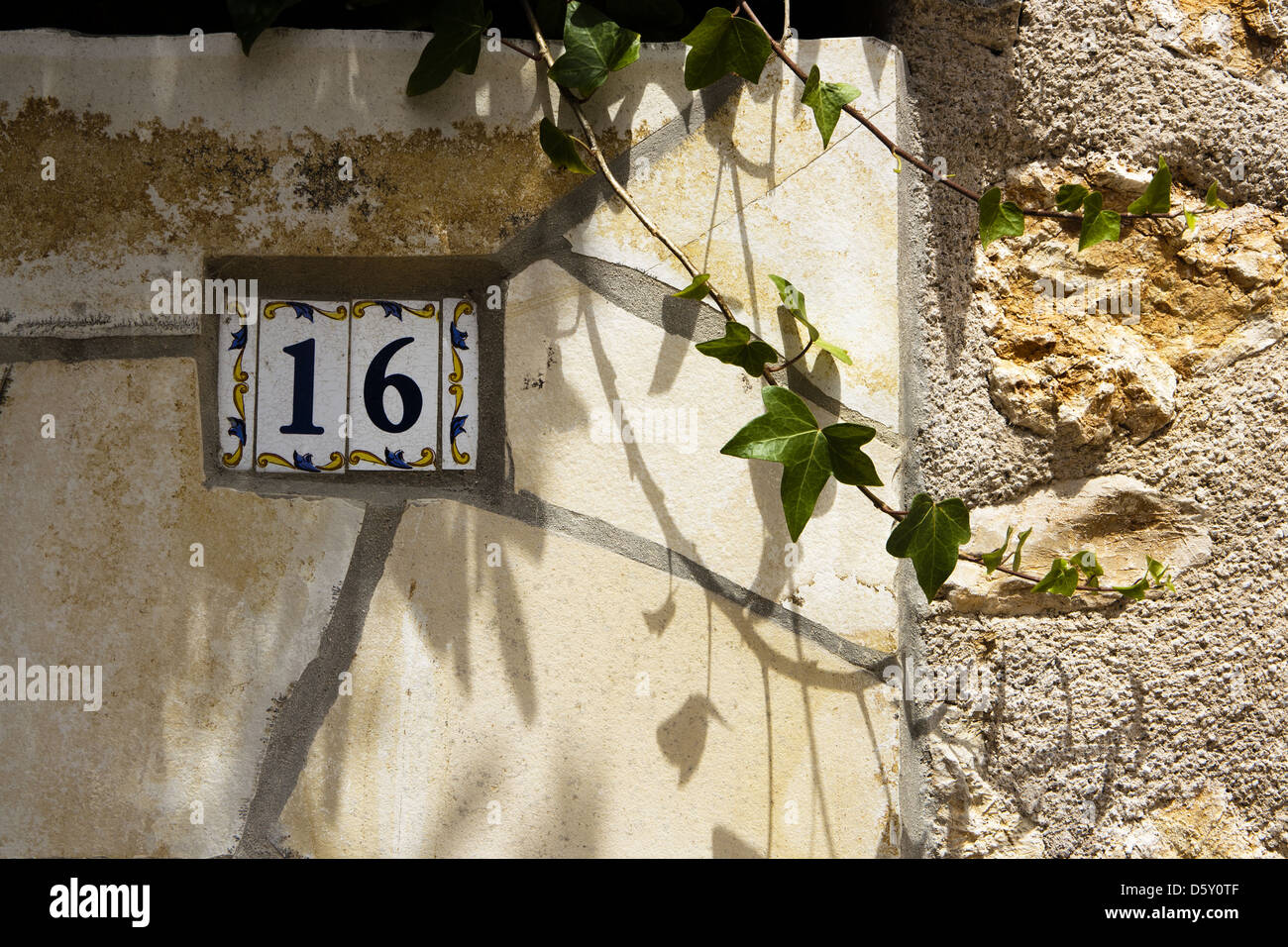 wall with house number Stock Photo - Alamy