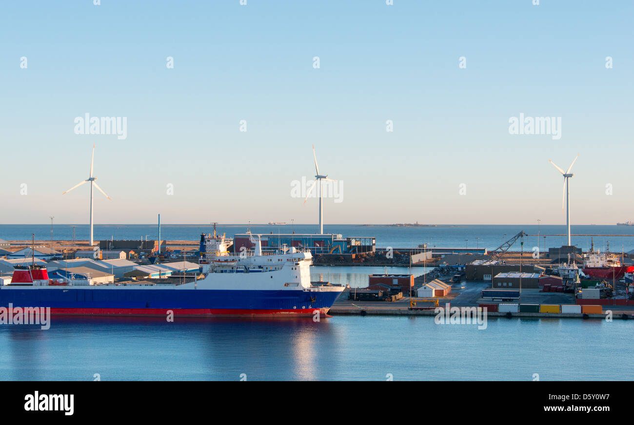 Cargo port and windmill Stock Photo - Alamy