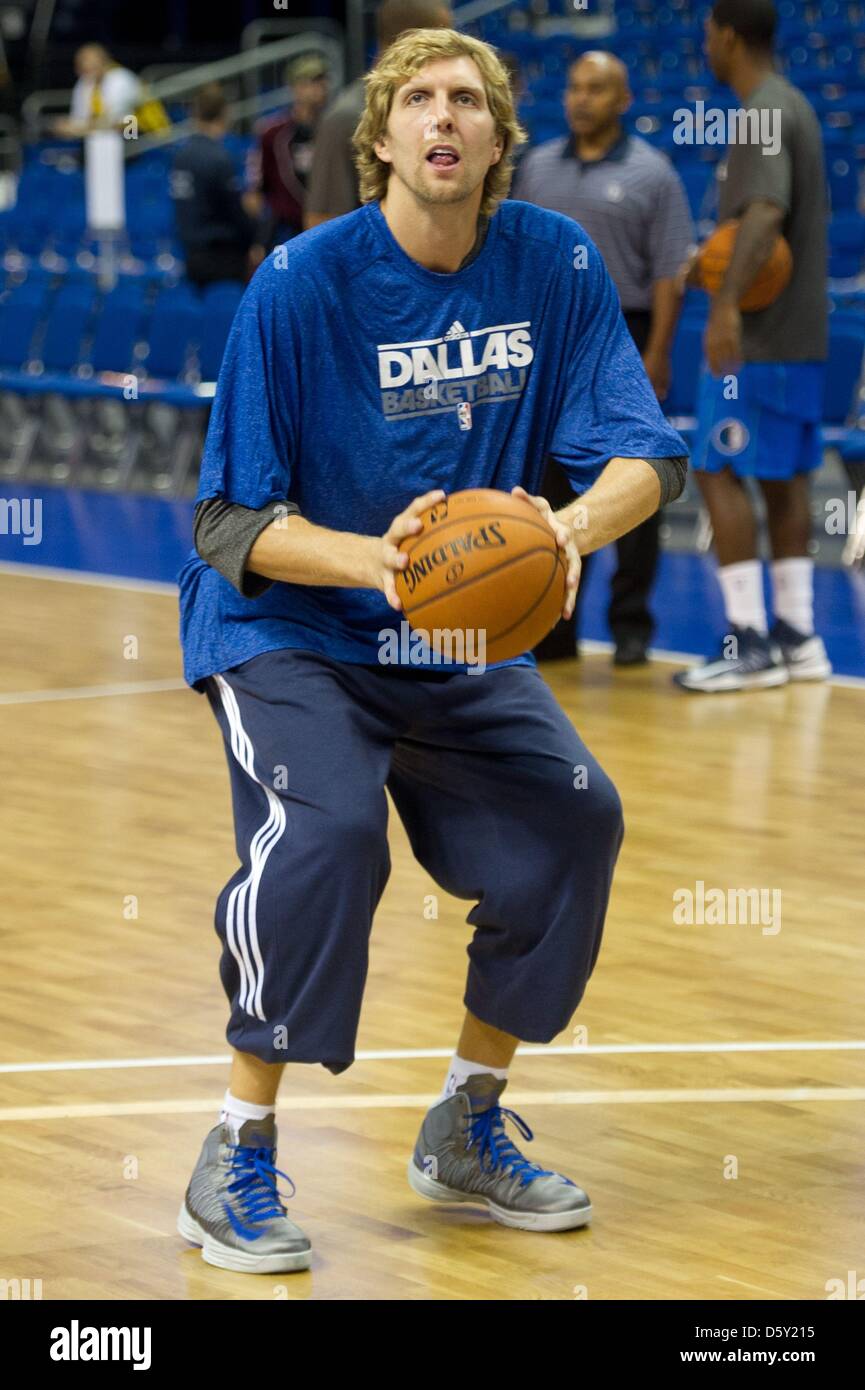 Dirk Nowitzki of the Dallas Mavericks controlls the basketball before ...