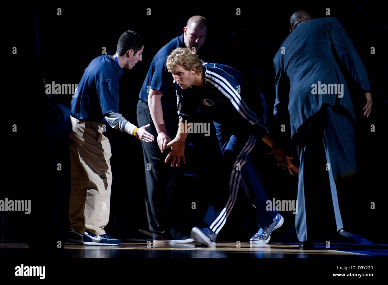Dirk Nowitzki (center) of the Dallas Mavericks enters the court before ...