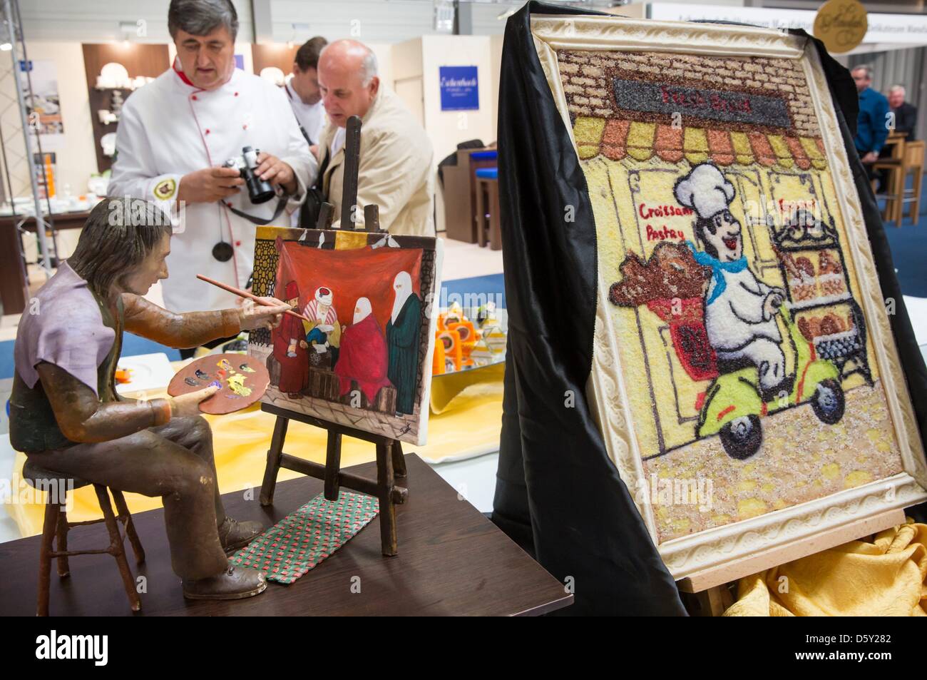 Visitors view a showpiece by the chefs of the German national team at ...