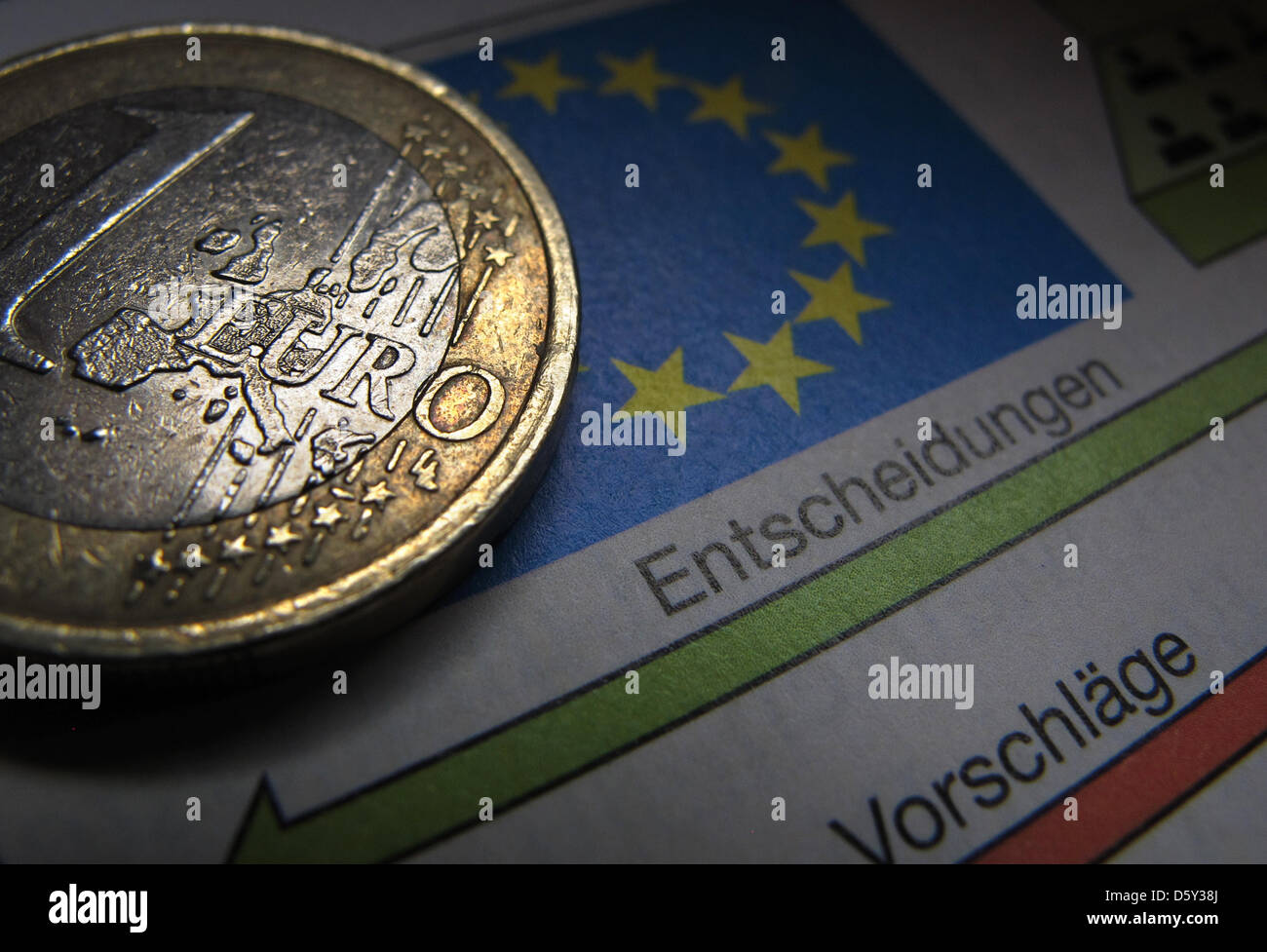 ILLUSTRATION - A one euro coin sits on a history book displaying the ...