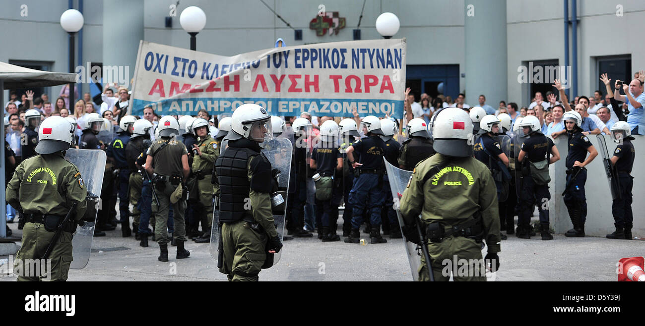 Police officers secure the route of German Chancellor Angela Merkel in ...