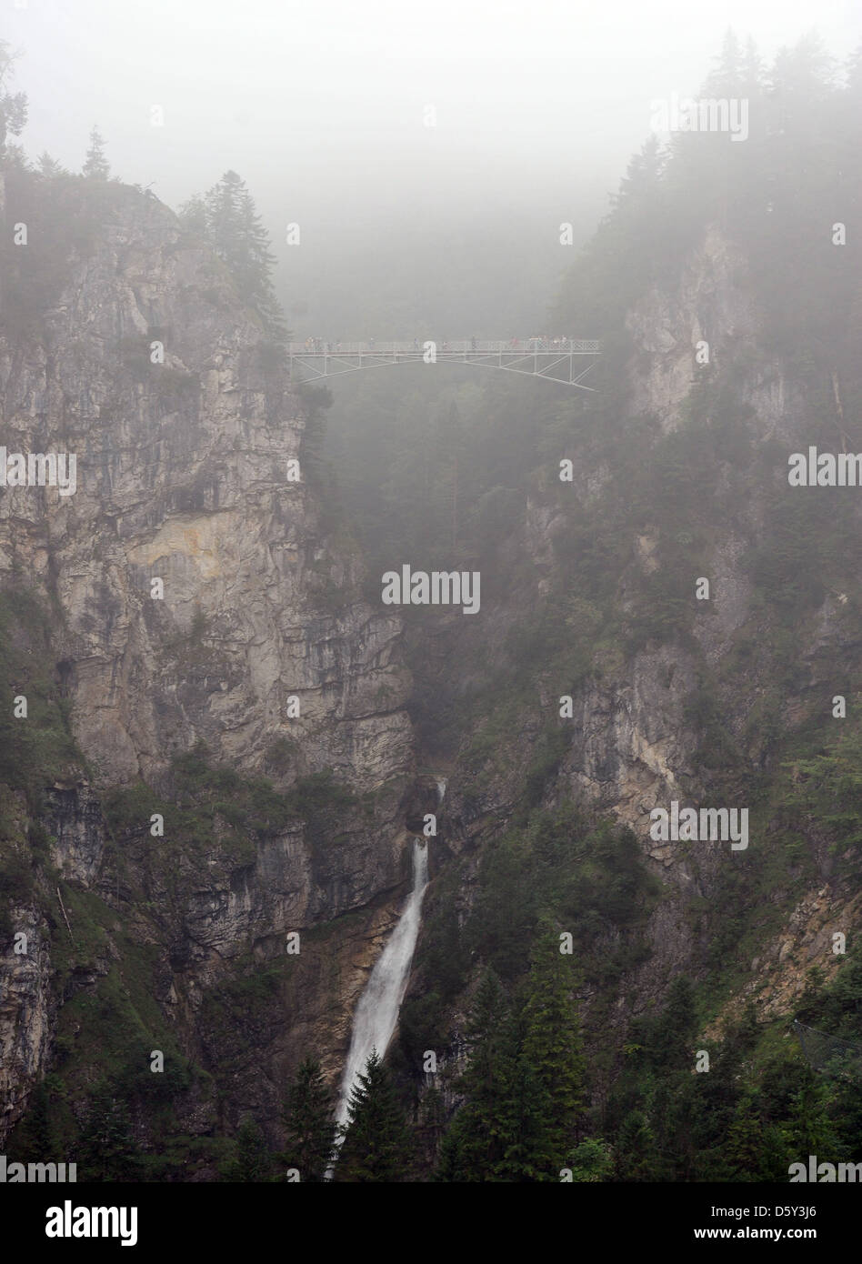 Tourists stand on the Marien bridge which spans the Poellat gorge ...
