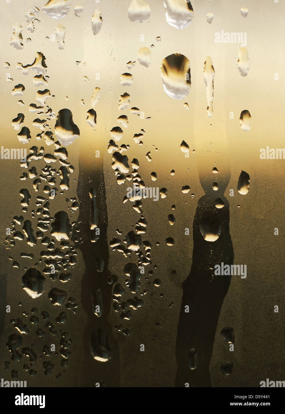 Water drops and sunlight on window glass Stock Photo - Alamy