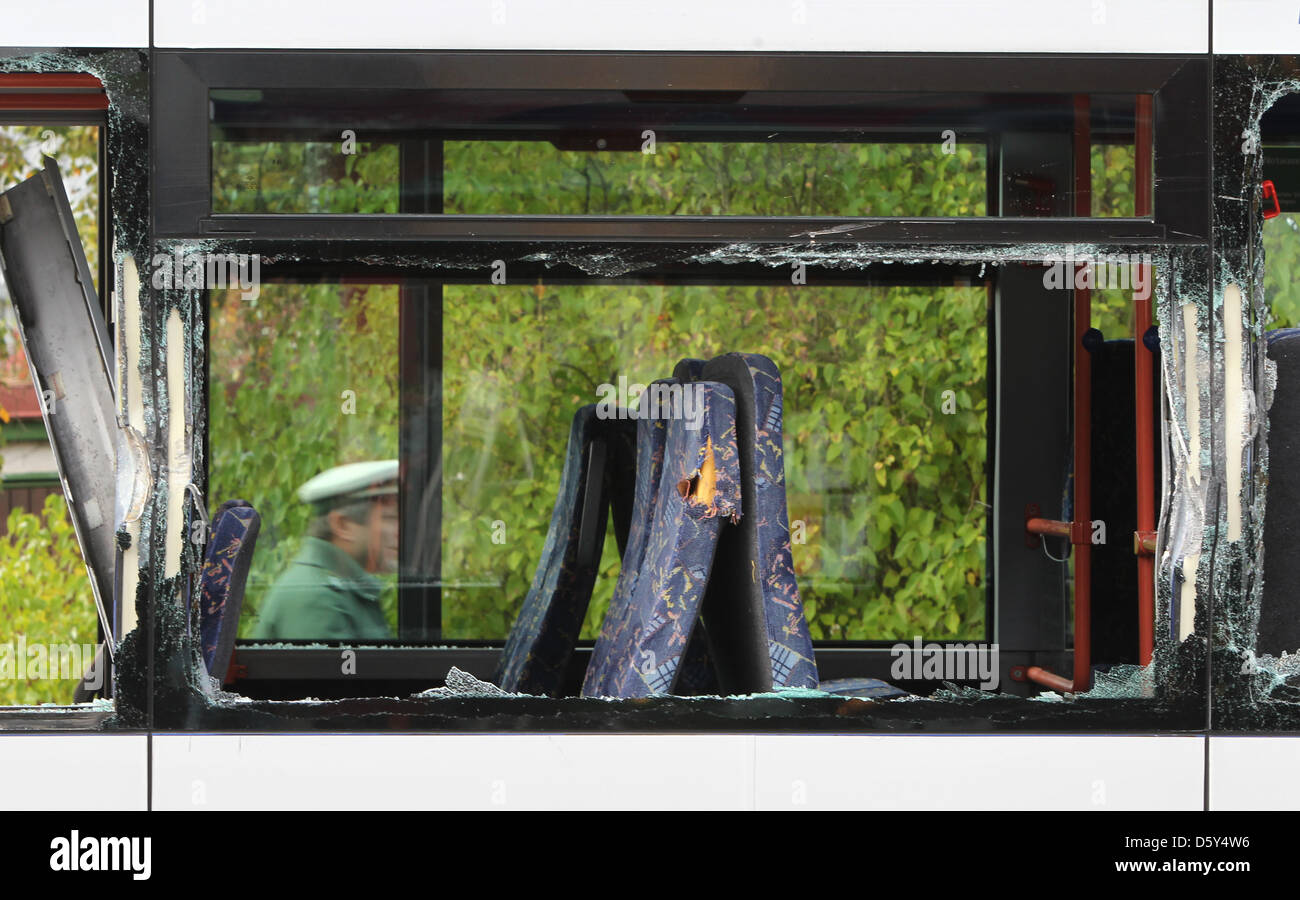 A school bus with destroyed windows is visible in Marktoberdorf ...