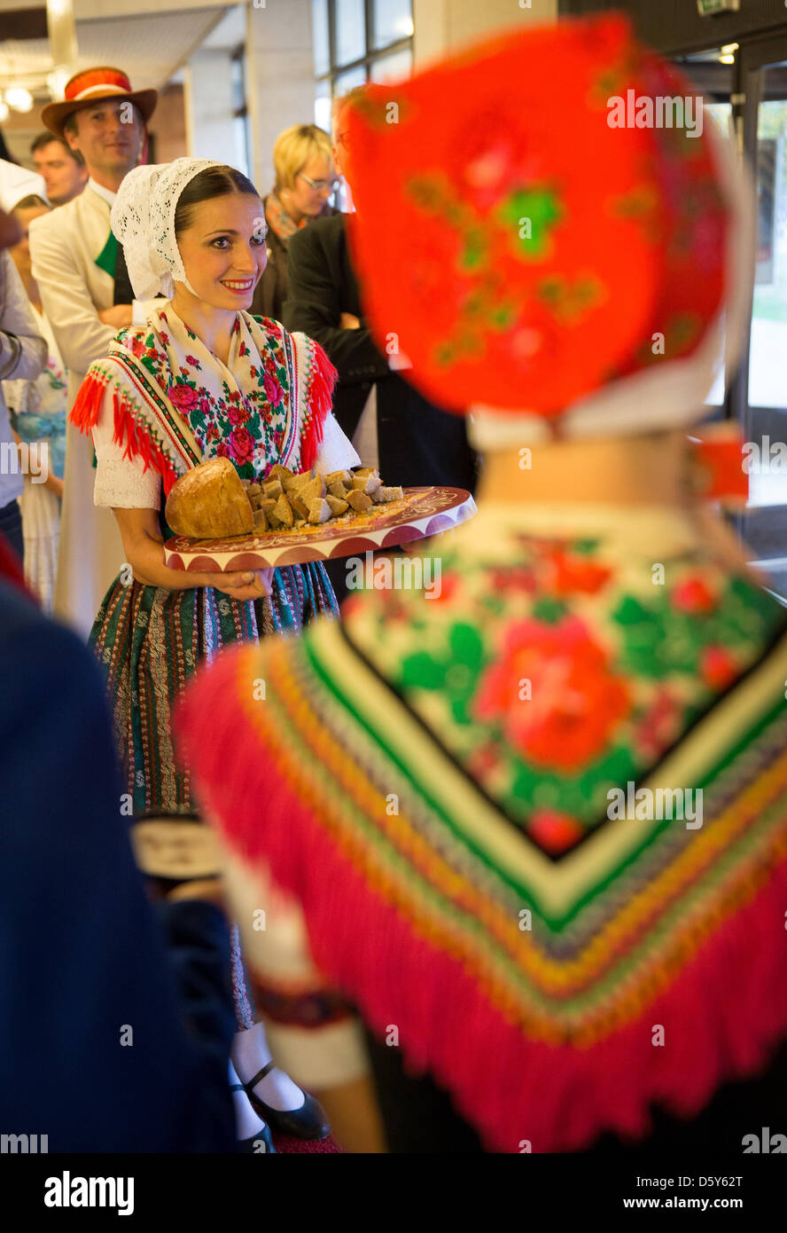 People wearing Sorbian traditional costumes hand out bread and salt in ...