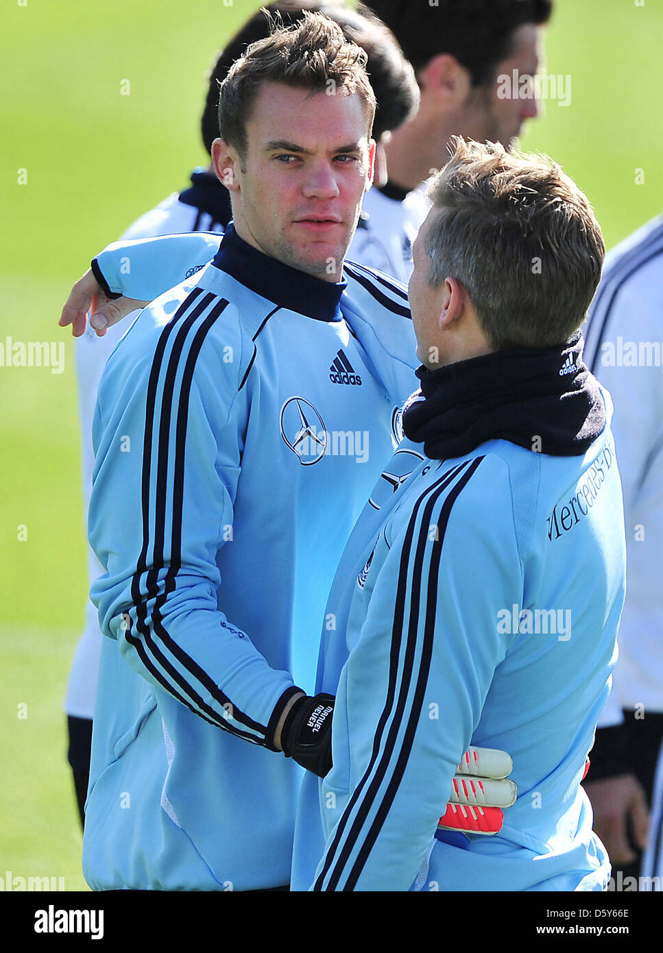 Goalkeeper Manuel Neuer and Bastian Schweinsteiger hug each other at ...