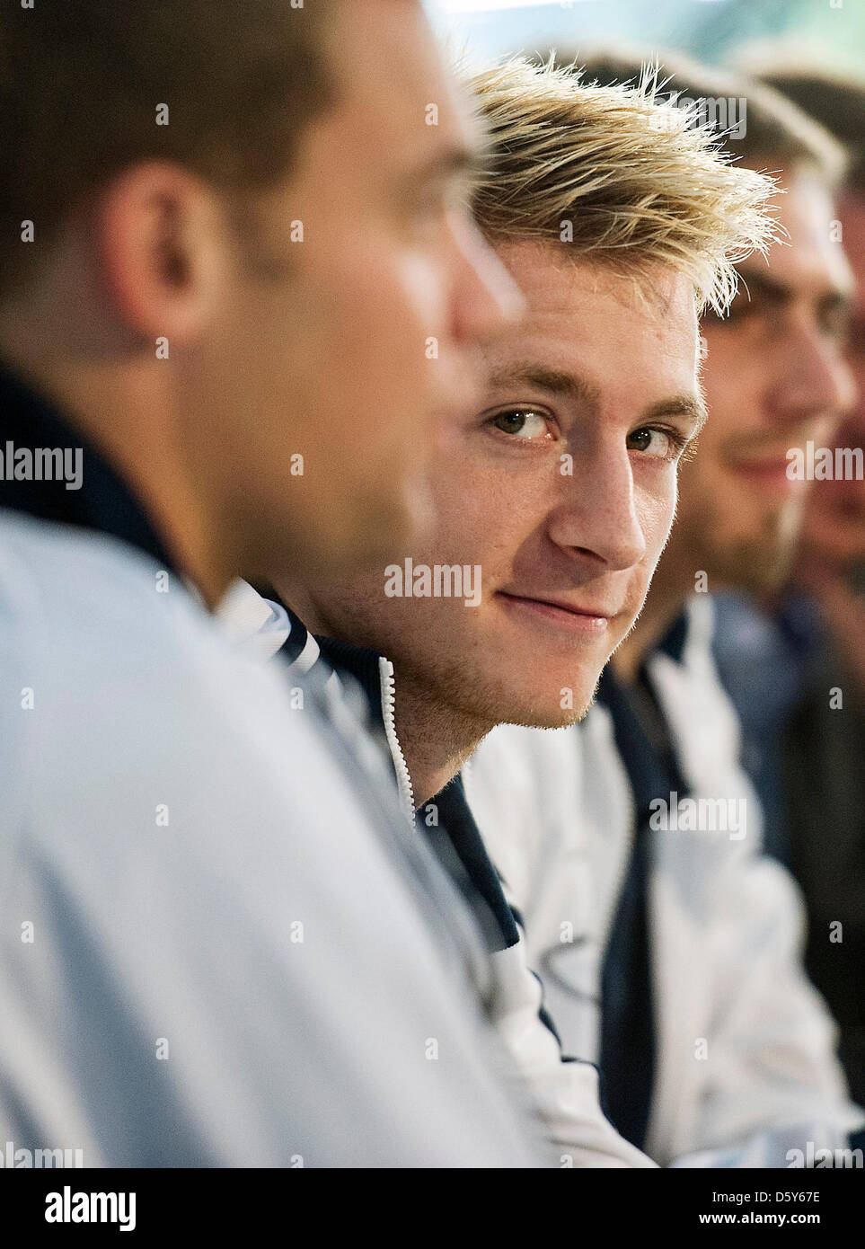 Goalkeeper Manuel Neuer (L-R), Marco Reus and Philipp Lahm speak at a ...