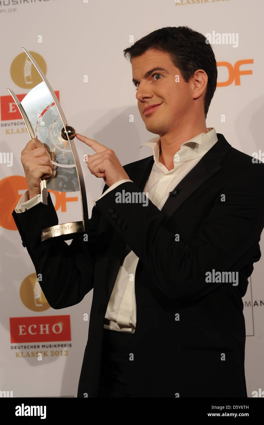 Opera singer Philippe Jaroussky presents his Echo Klassik award in the ...