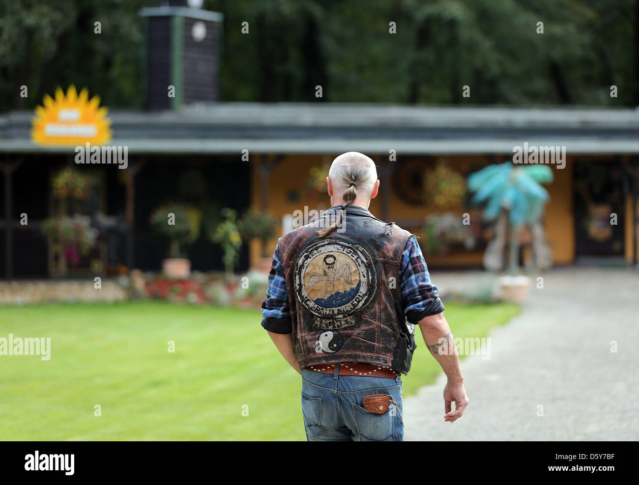Rocker 'Leines' (Uwe-Edmund Gaworski) walks over the grounds over the ...