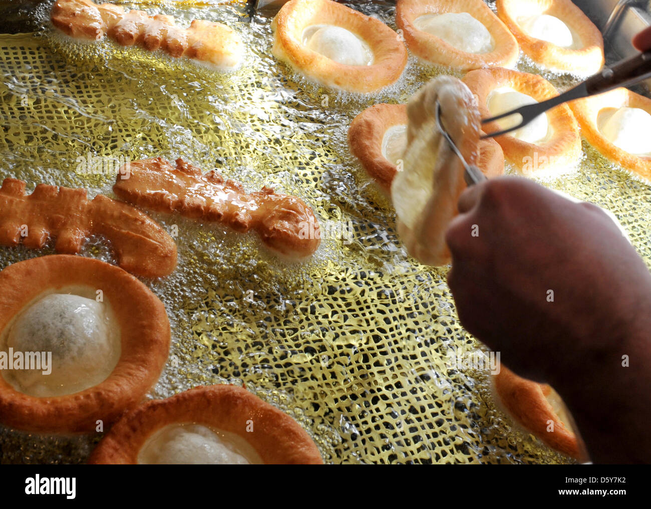 Pastries, Schmalzgebaeck, from leavened dough swim in hot oil at Cafe ...
