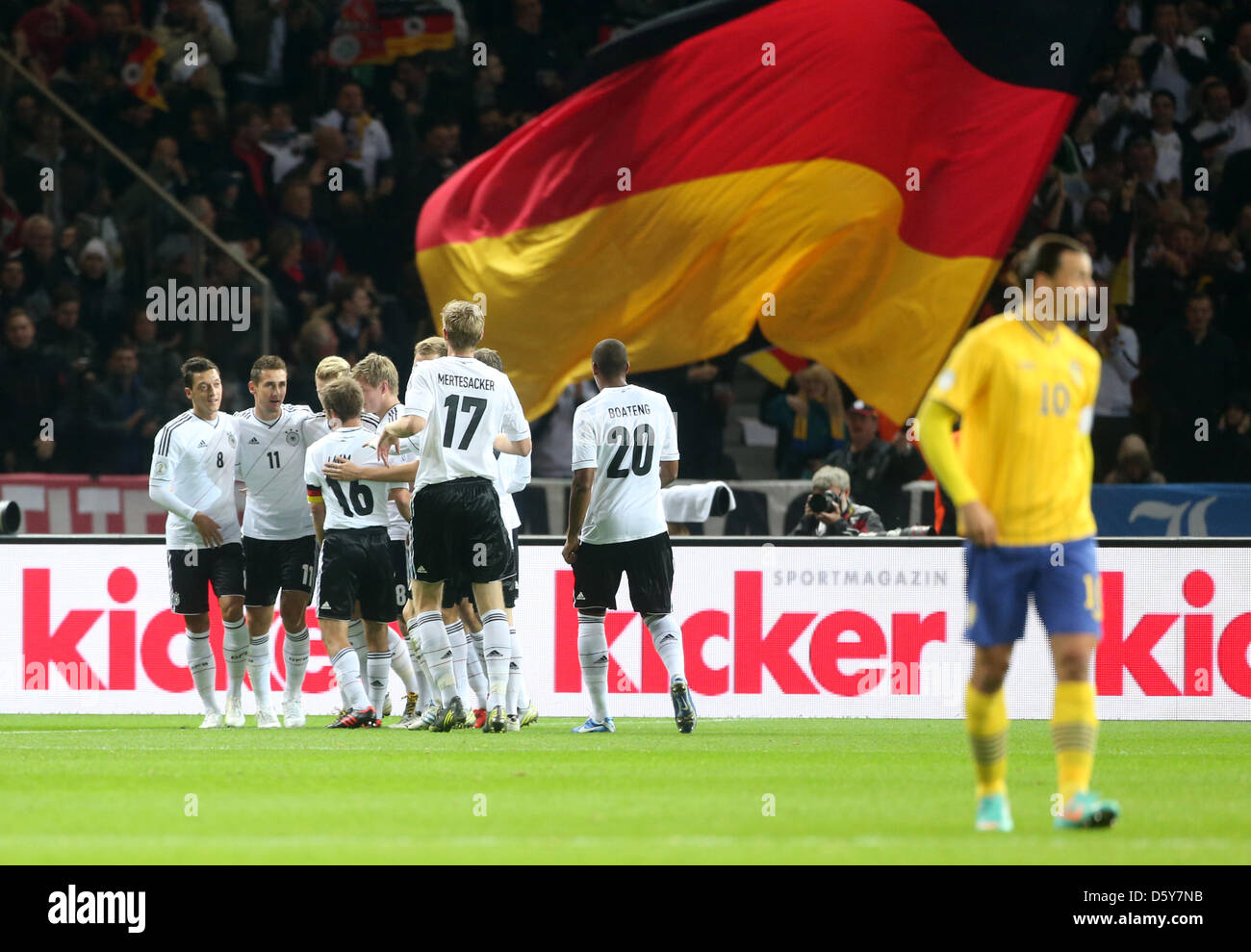 Germany's player celebrate after scoring during the FIFA World Cup 2014 ...
