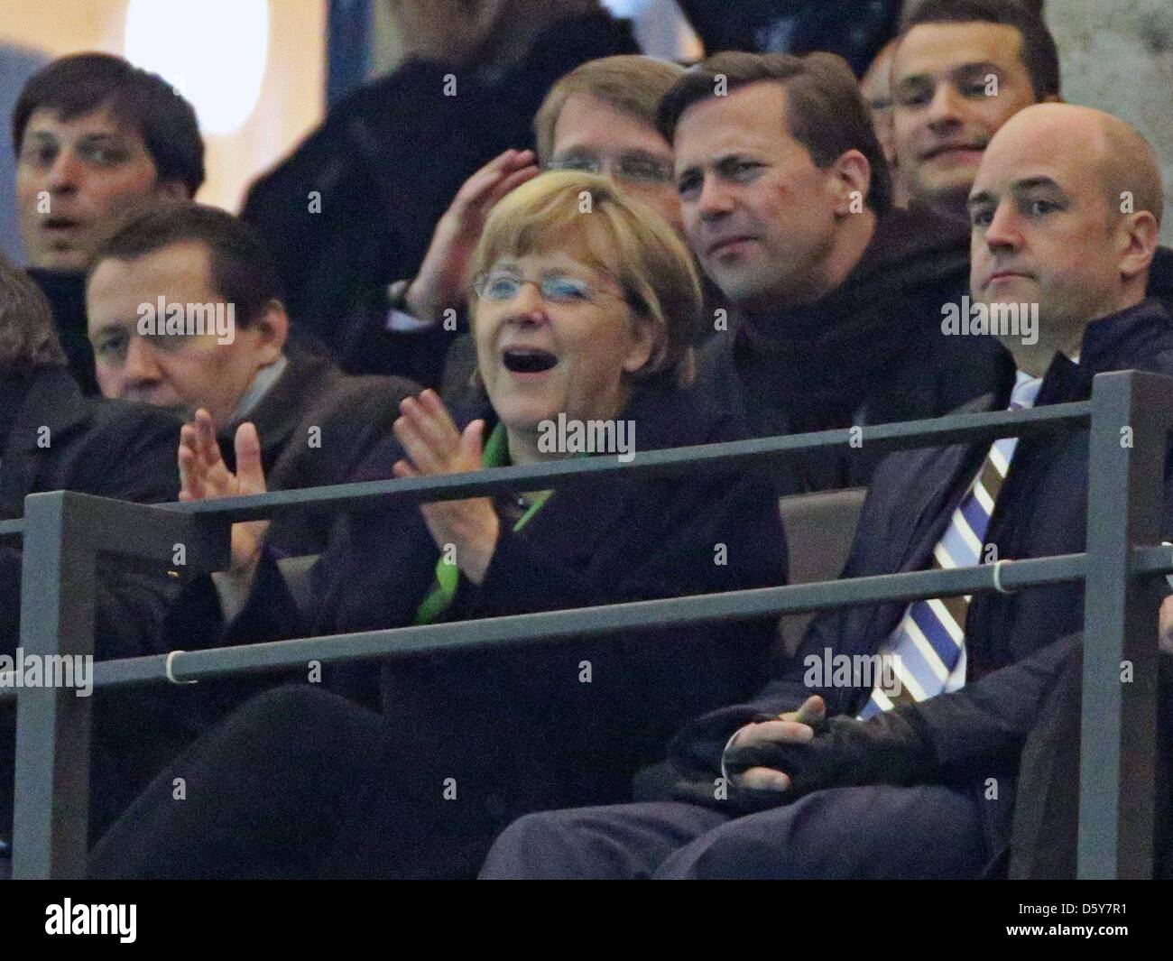 German chancellor Angela Merkel (C) celebrates during the FIFA World ...