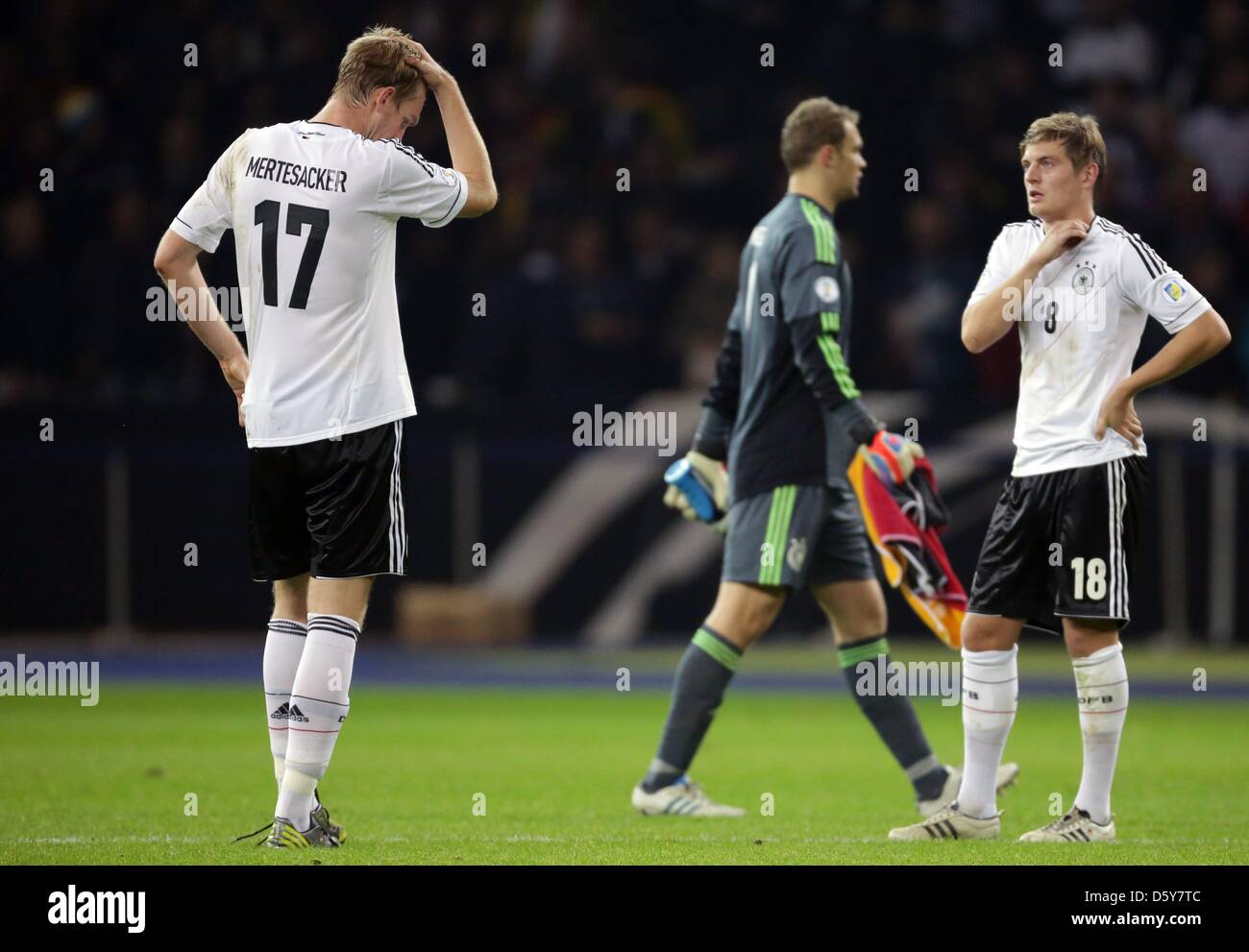Germany's (L-R) Per Mertesacker, goal keeper Manuel Neuer and Toni ...
