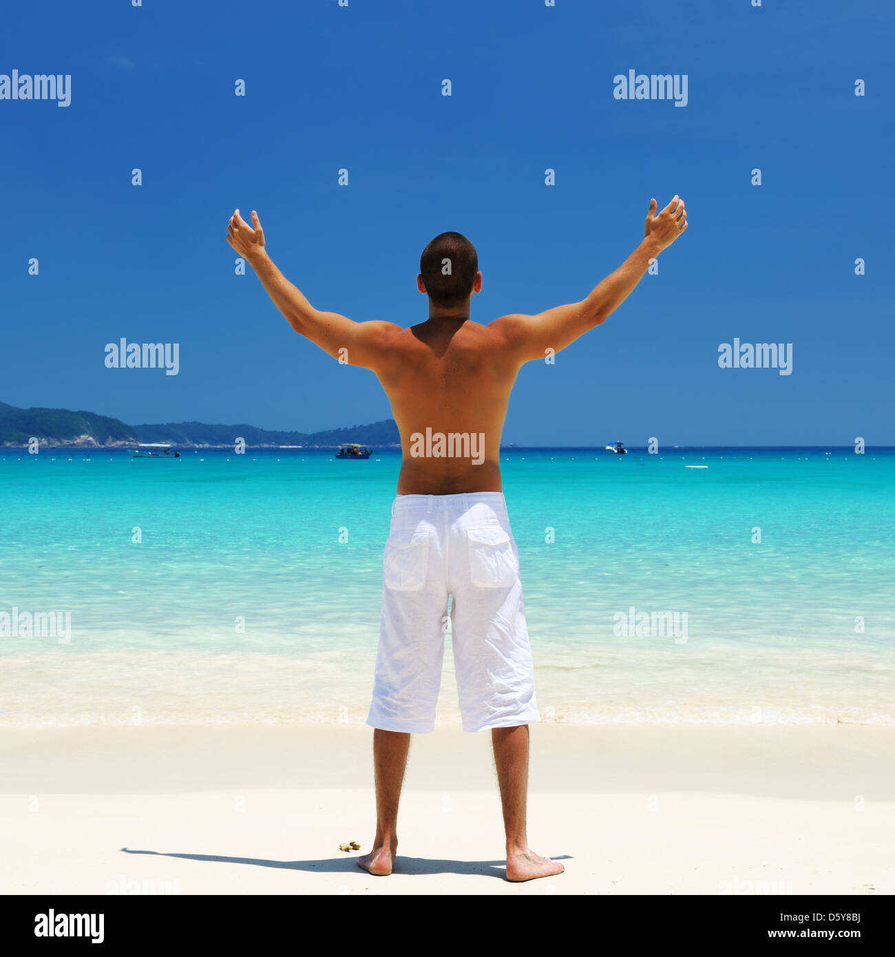 Man at beach Stock Photo - Alamy